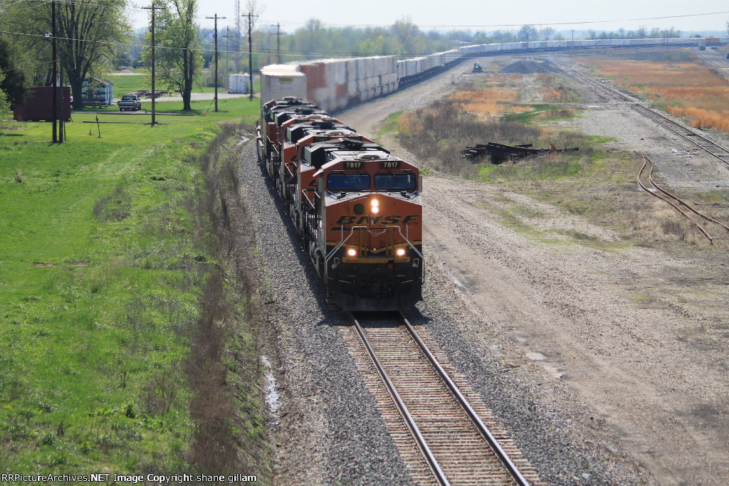BNSF 7817 leads a hot and long eb z train.